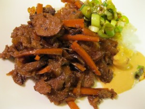 open-faced seitan bulgogi burger with a rice patty bun | veg here